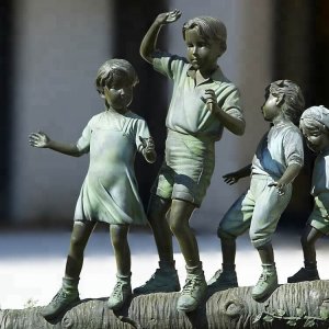 Playing On Tree Stump Boy And Girl Bronze Garden Statues For Sale ...